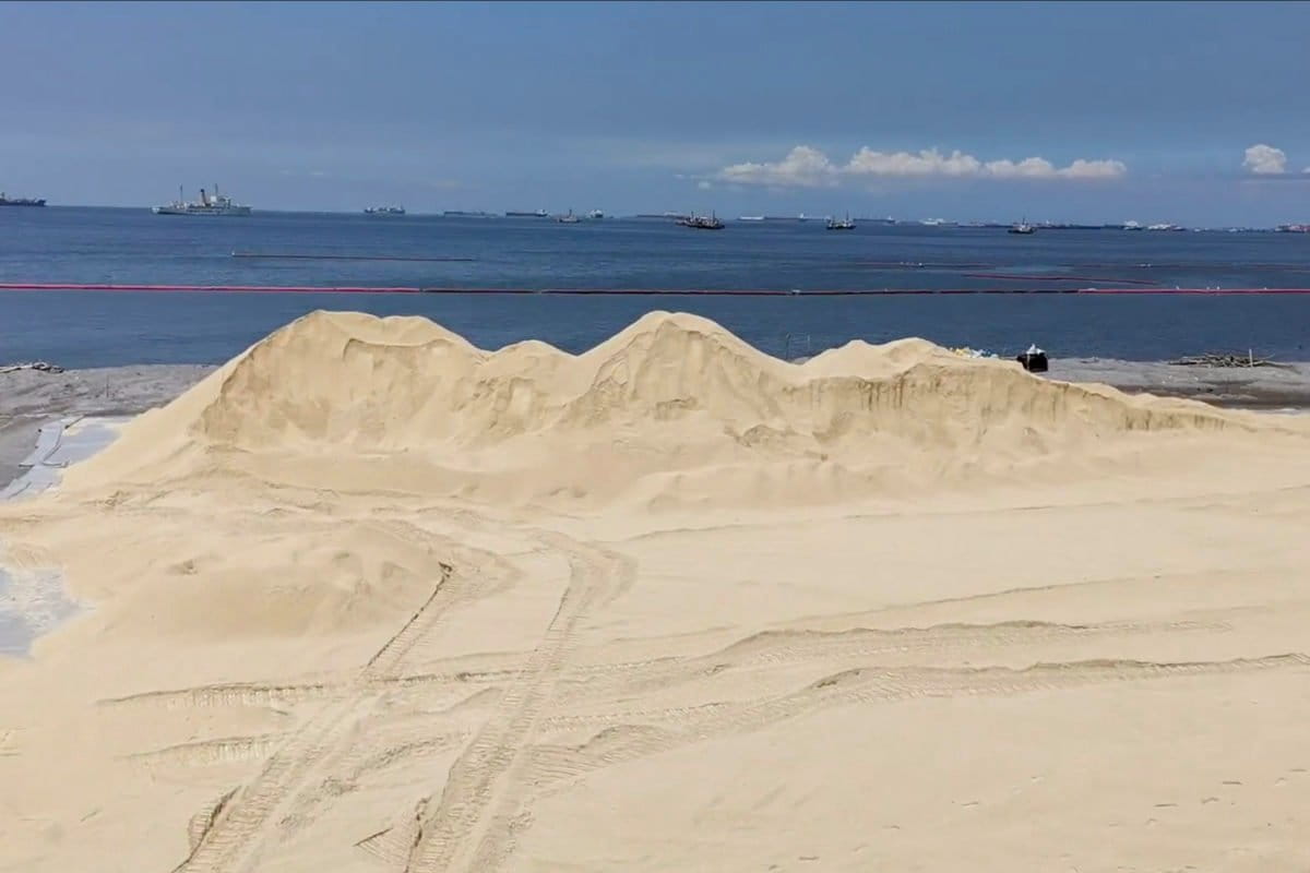 Manila’s new white sand coast is a threat to marine life, groups say