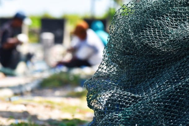 Small-scale fishers in Indonesian isles flag use of banned net by outsiders