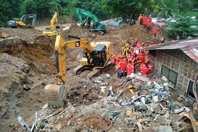 Landslide in Philippines mining town kills nearly 100, prompts calls ...