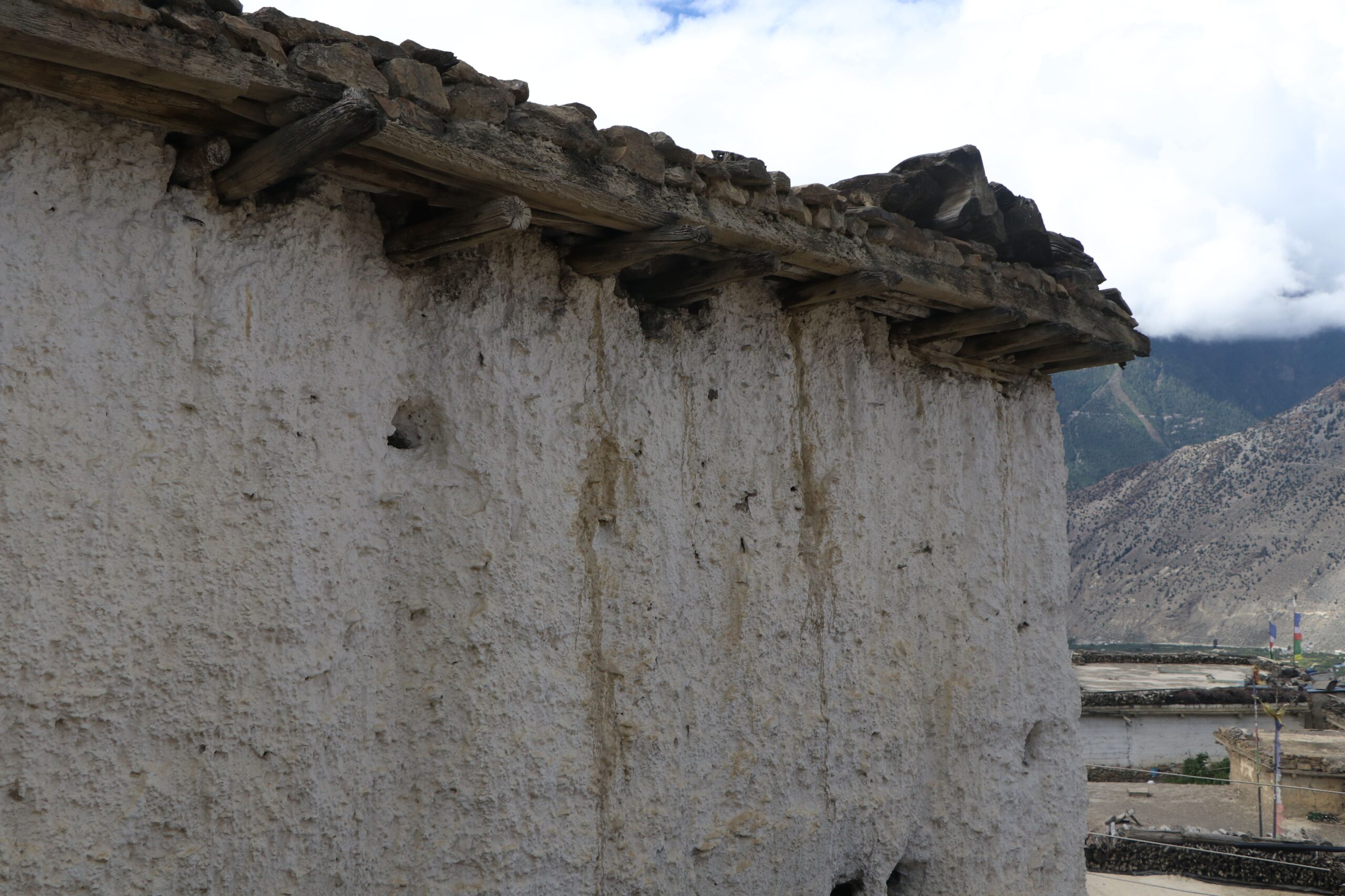 Changing weather patterns threaten time-tested houses in Nepal village